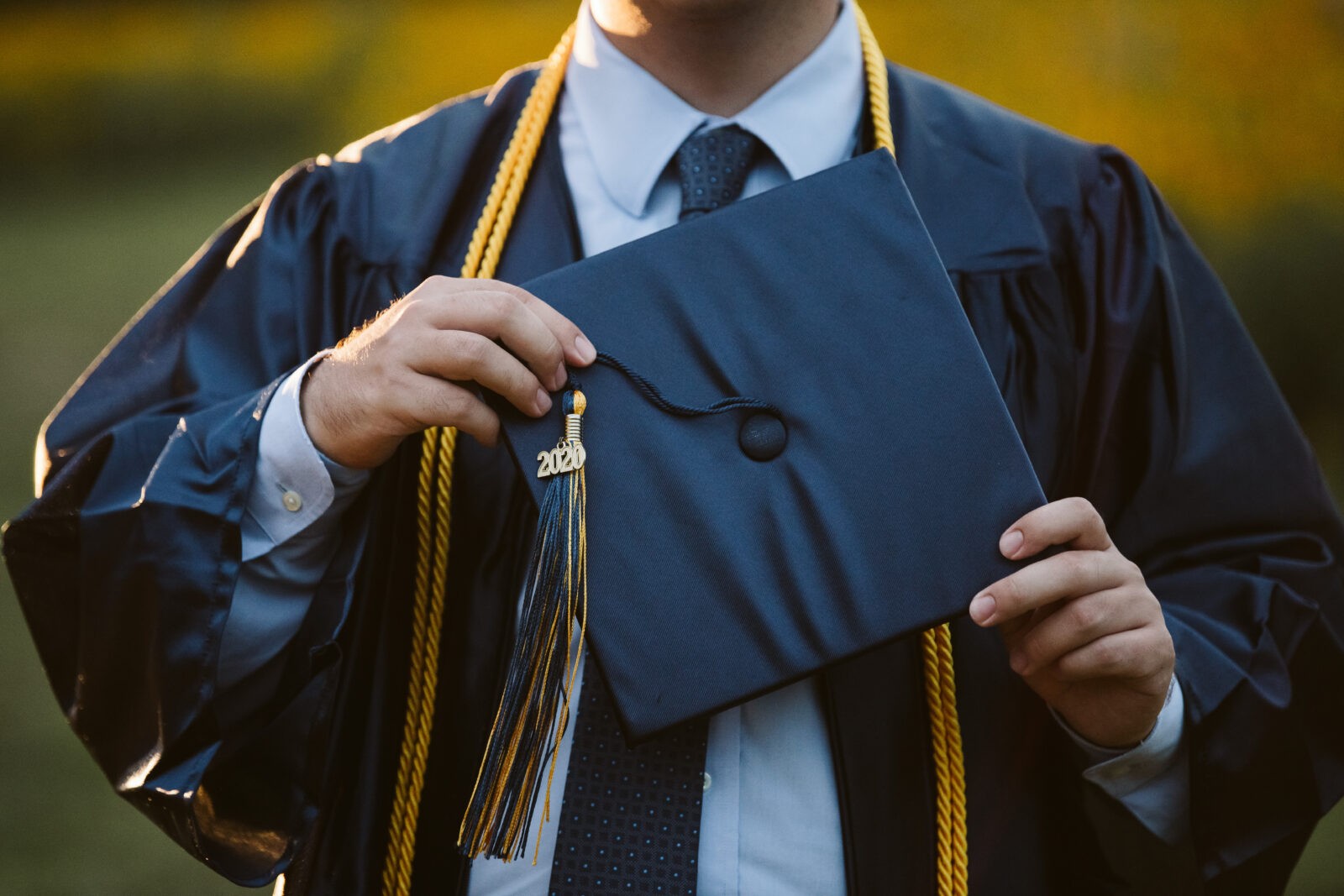 College Shirt + Cap and Gown Senior Pictures